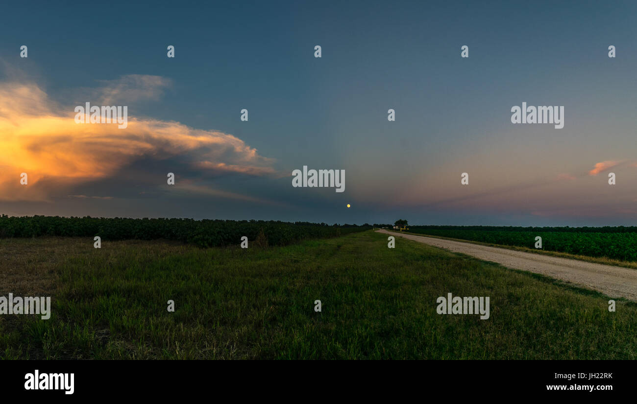 Storm clouds building over a small town Stock Photo - Alamy