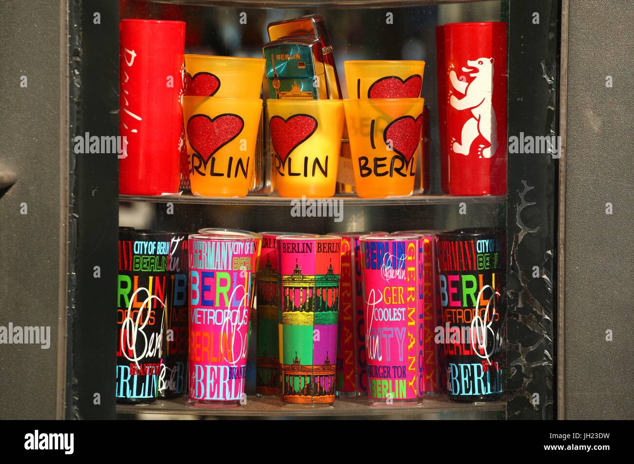 Berlin souvenirs are seen in the window of a small gift and souvenirs ...