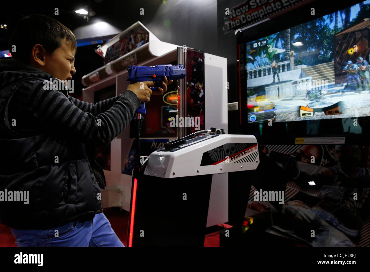 10-year-old boy playing a video game. France Stock Photo - Alamy