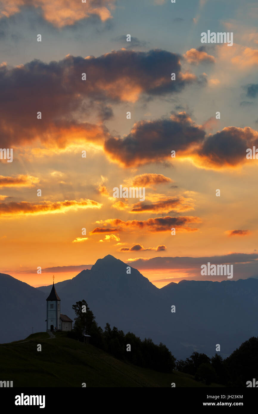 Jamnik church of Saints Primus and Felician at sunrise, perched on a ...