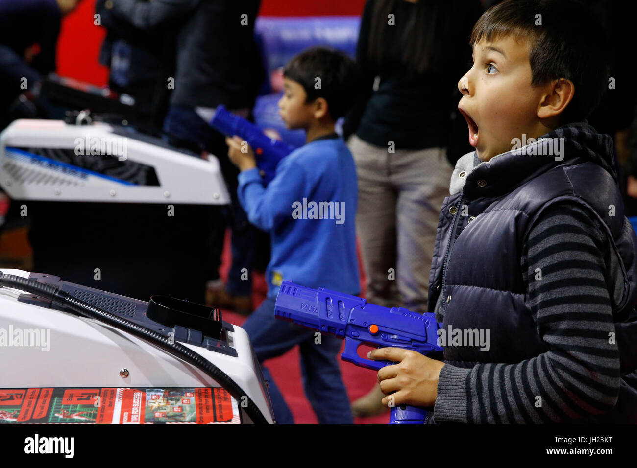 10-year-old boy playing a video game. France Stock Photo - Alamy