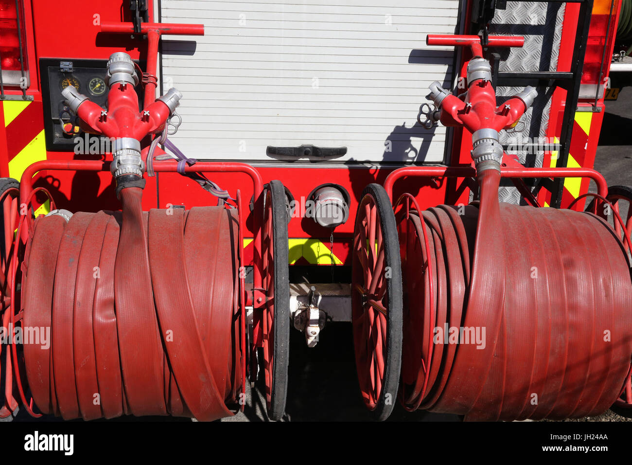 Fire truck. Pipe Stock Photo - Alamy
