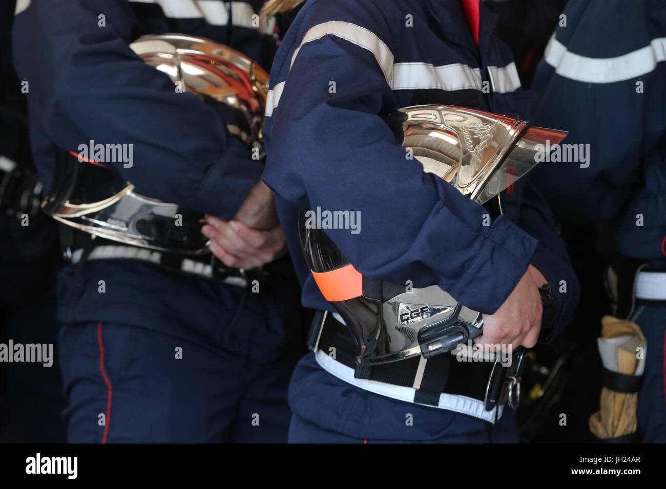 Firefighter and helmet. France Stock Photo - Alamy