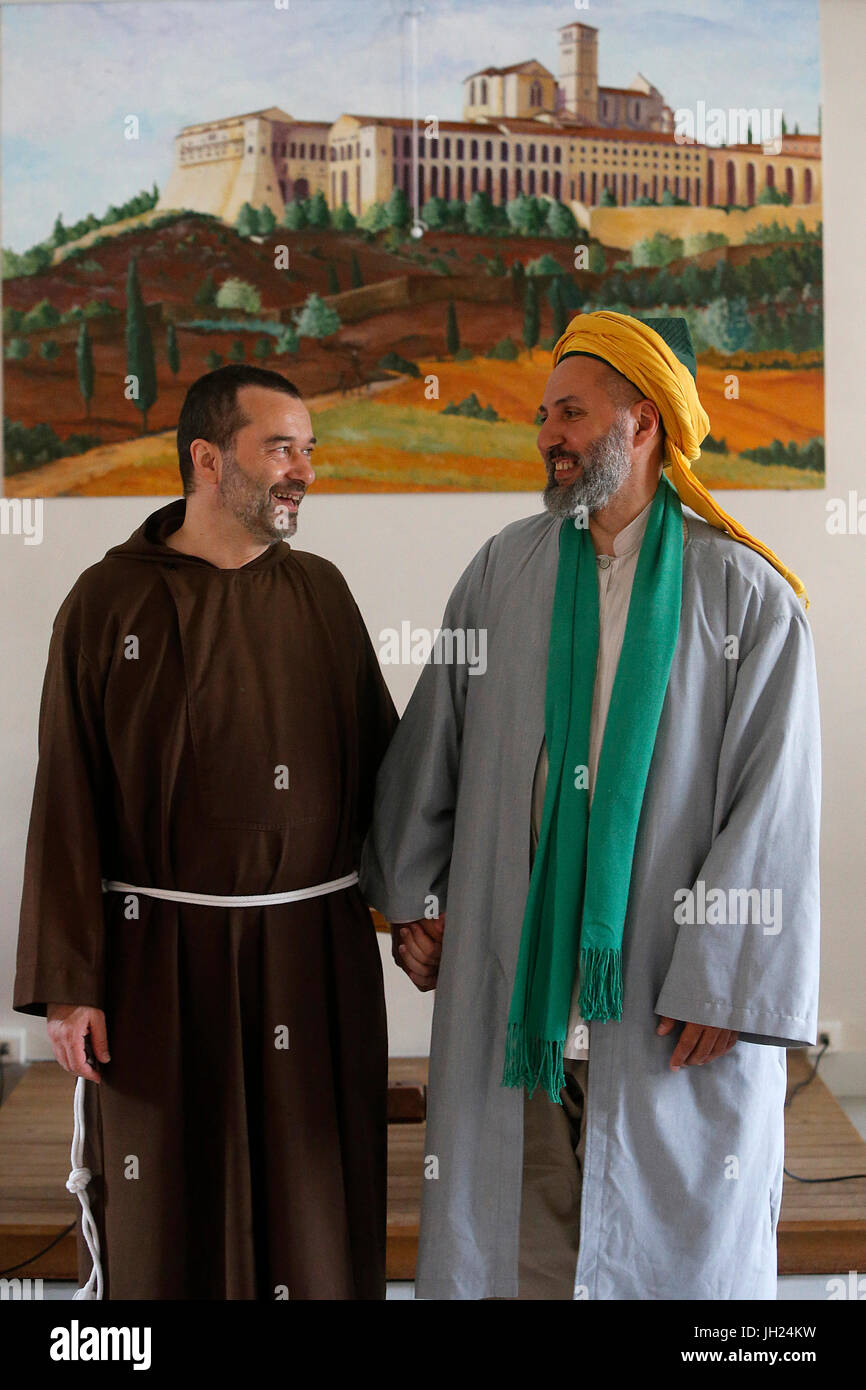 Capuchin friar Brother Pascal holding hands with Hajj Abd el Hafid Benchouk, a sufi Naqshbandi ...