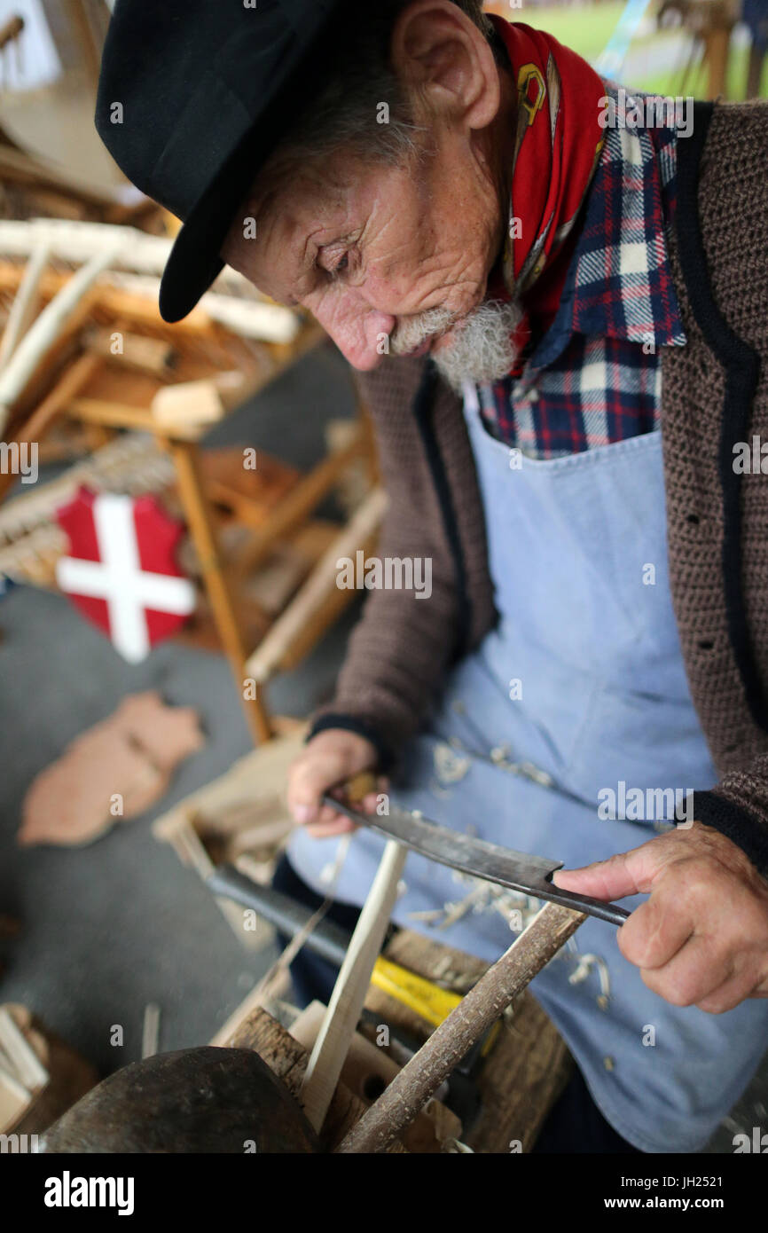 Old Domancy craft festival. Wood carver. France Stock Photo - Alamy