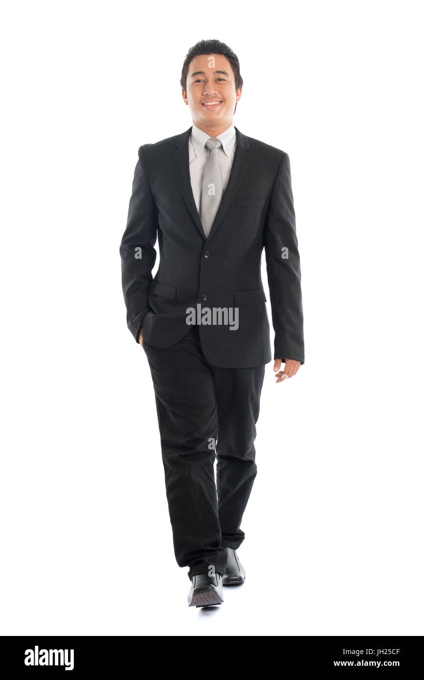 Full body front view portrait of young Southeast Asian businessman ...