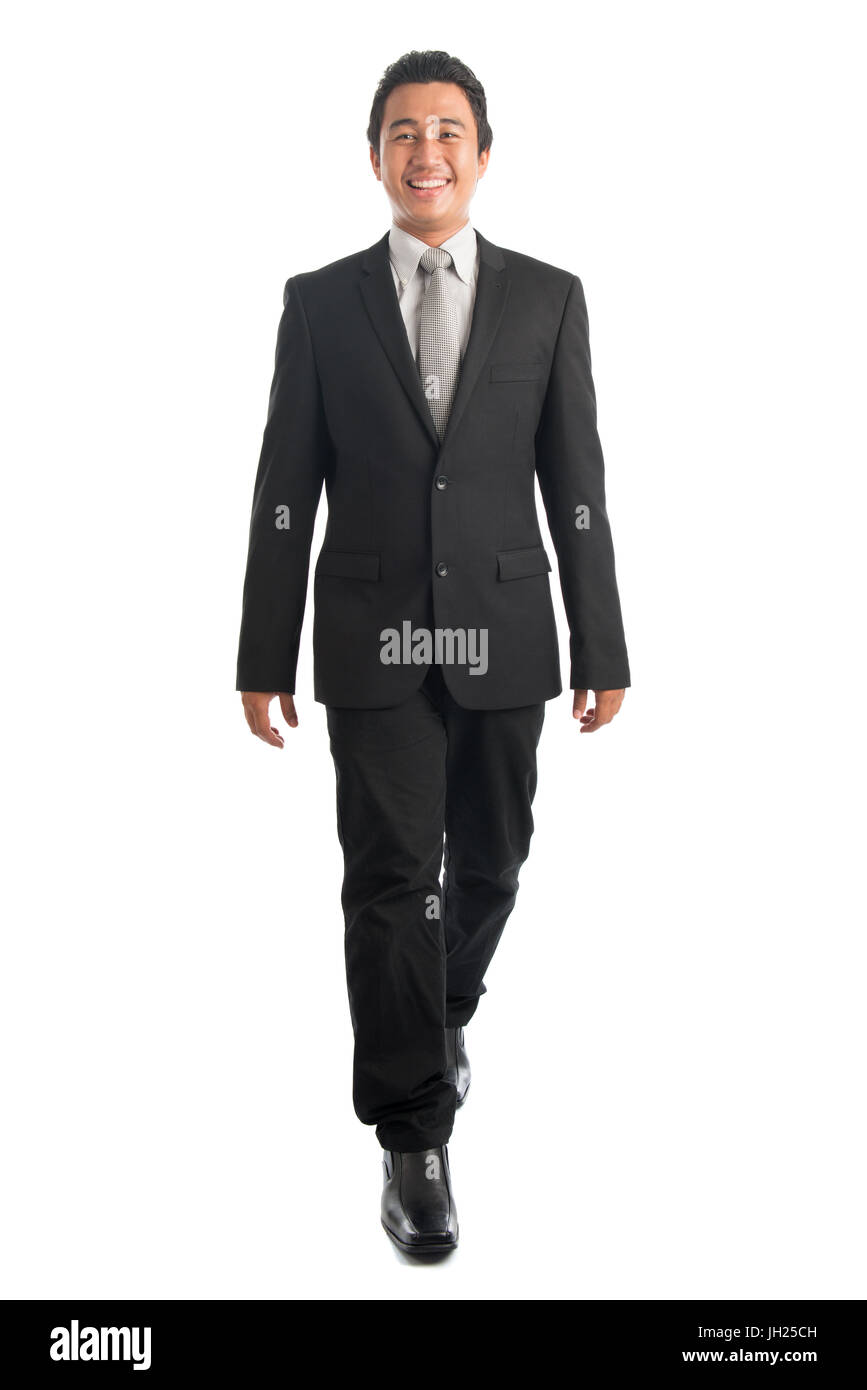 Full body front view portrait of smart young Southeast Asian ...
