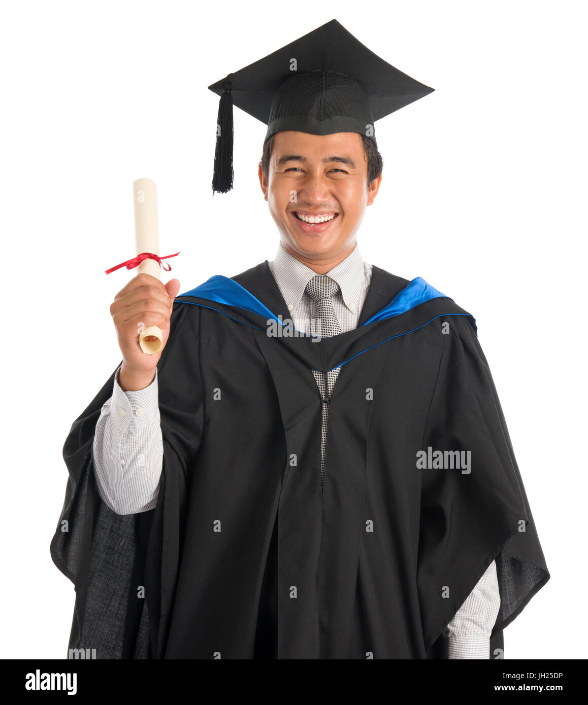 Waist up happy Asian male university student in graduation gown smiling ...