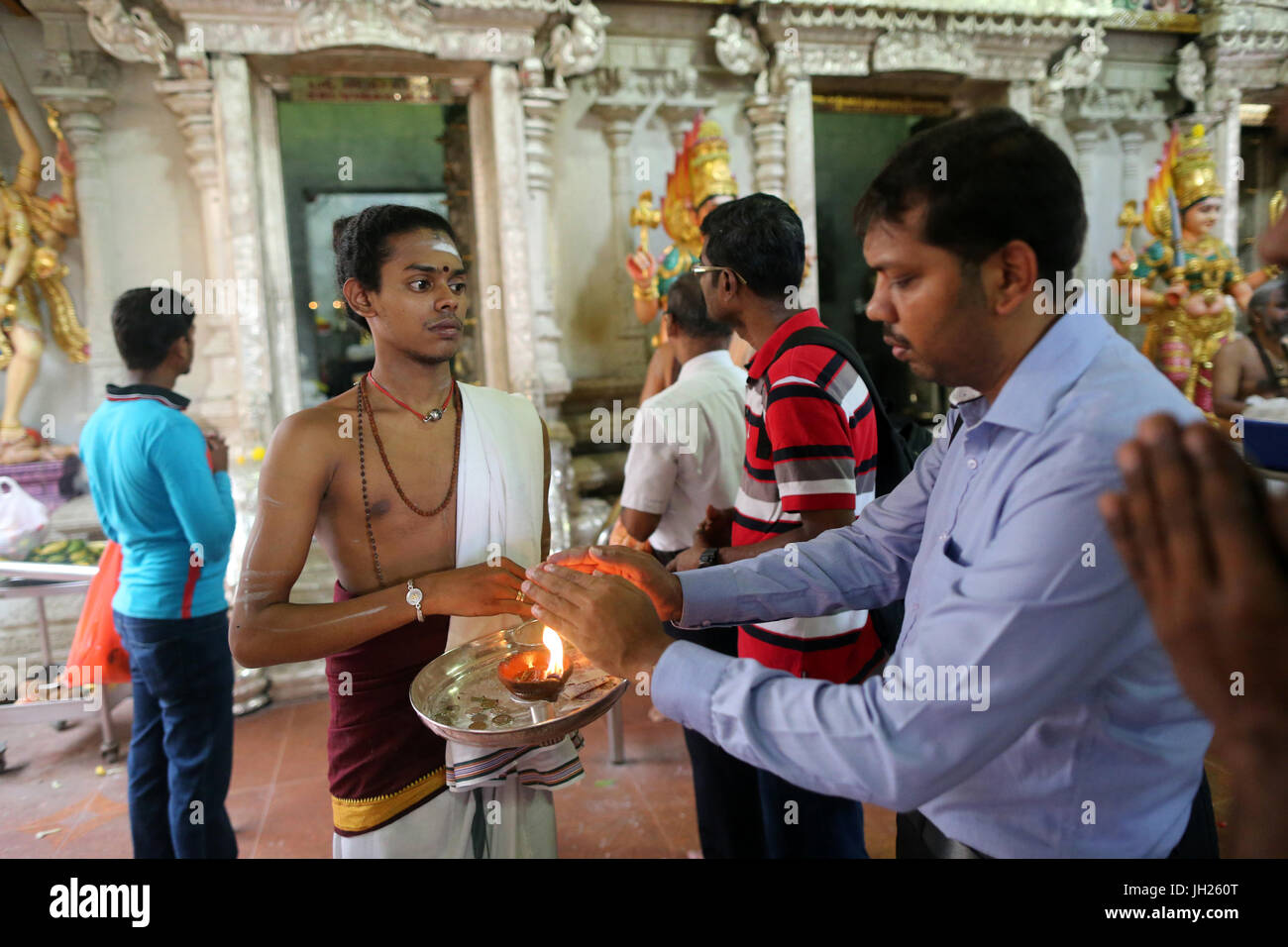 Hindu Praying In Temple