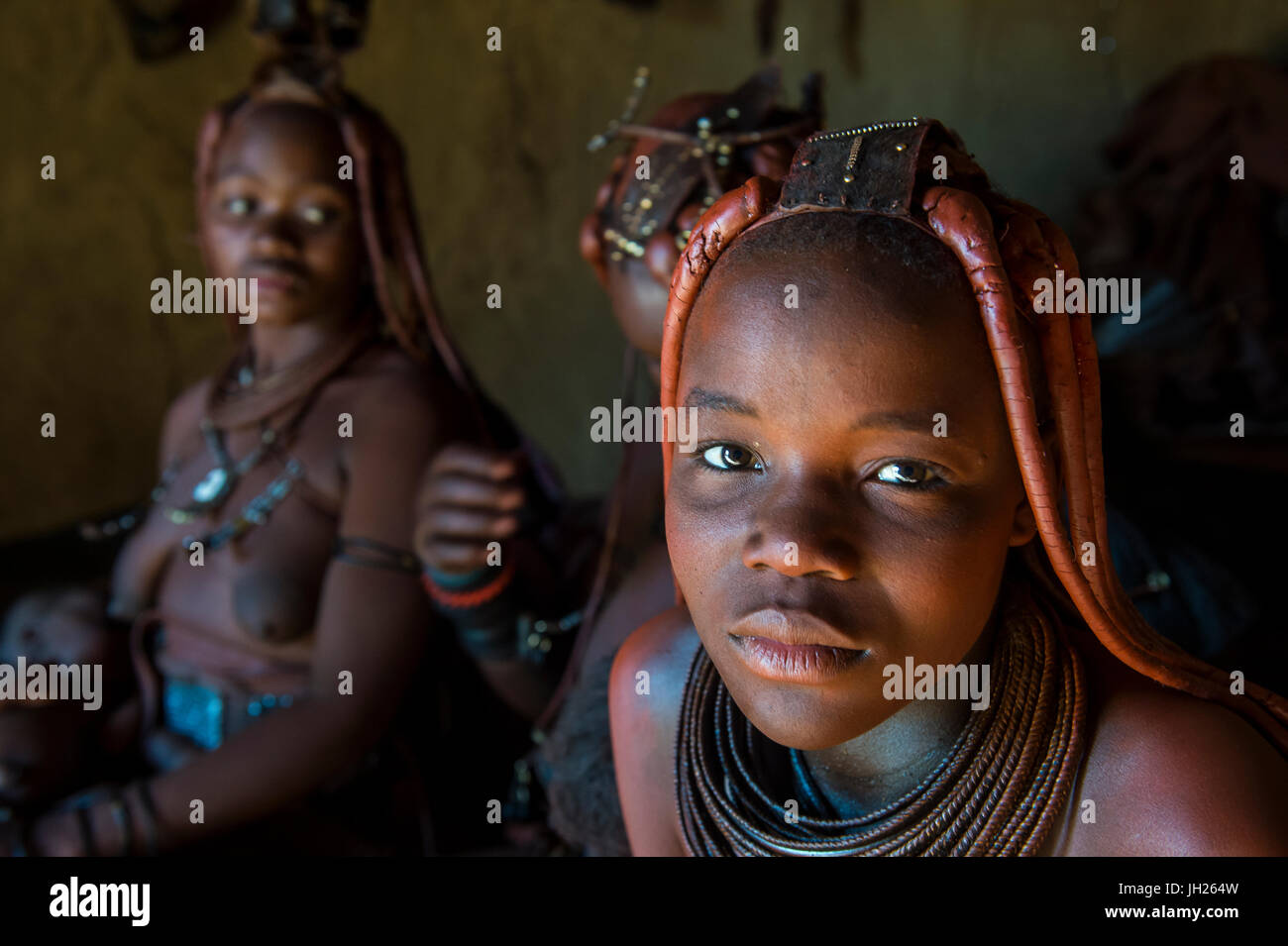 Friendly Himba women in their hut, Kaokoland, Namibia, Africa Stock ...