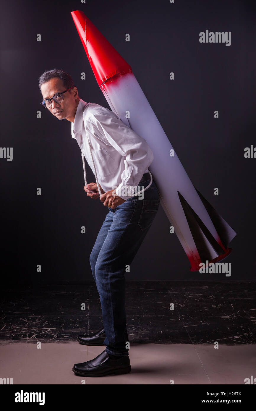 Man rocket on back hi-res stock photography and images - Alamy