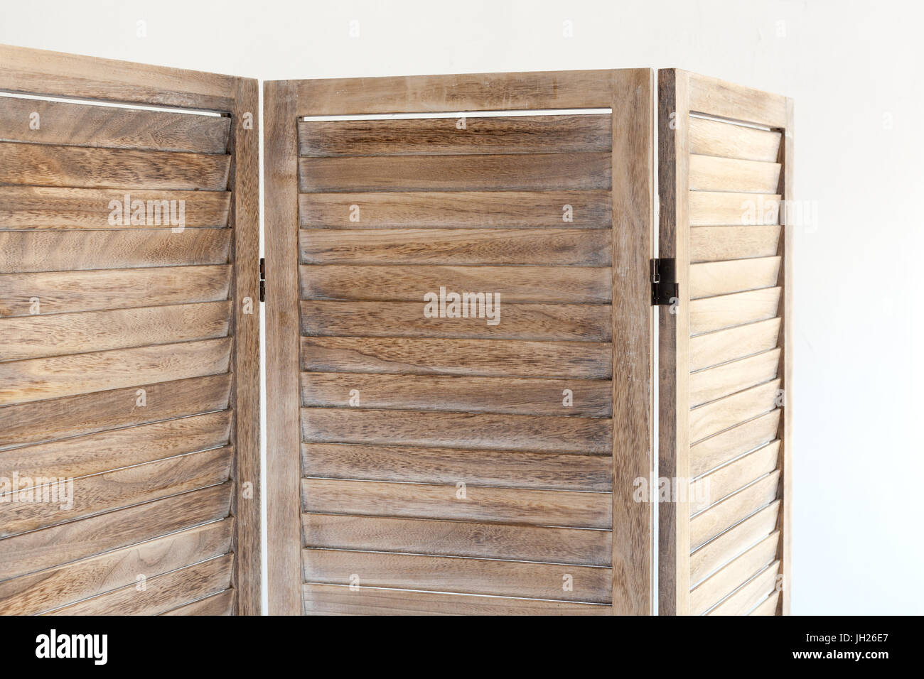 Close up of wooden folding screen on white background Stock Photo - Alamy