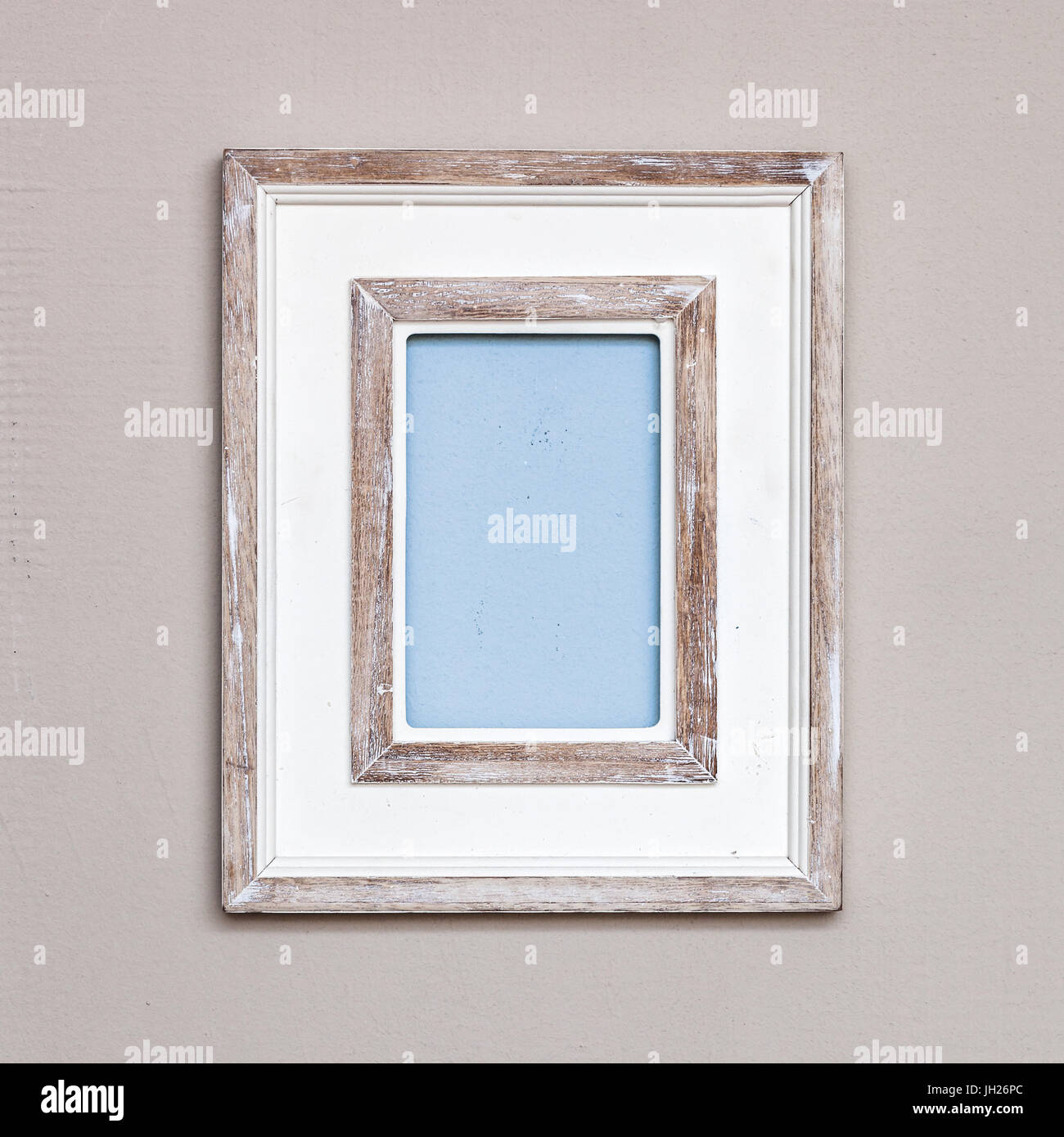 Empty wooden vintage picture frame on a wall Stock Photo - Alamy