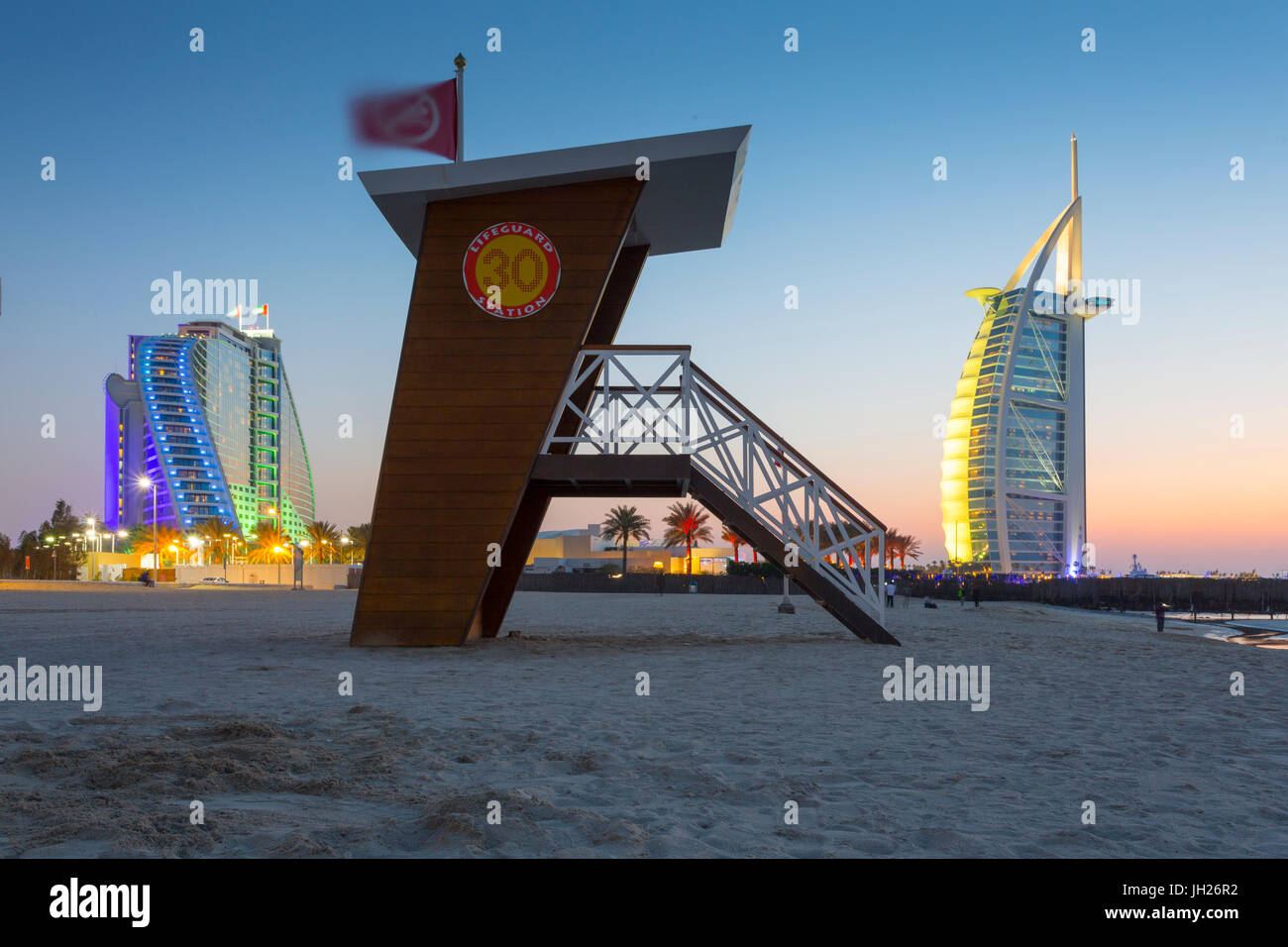 Burj Al Arab Hotel, sunset and lifeguard watchtower on Jumeirah Beach ...