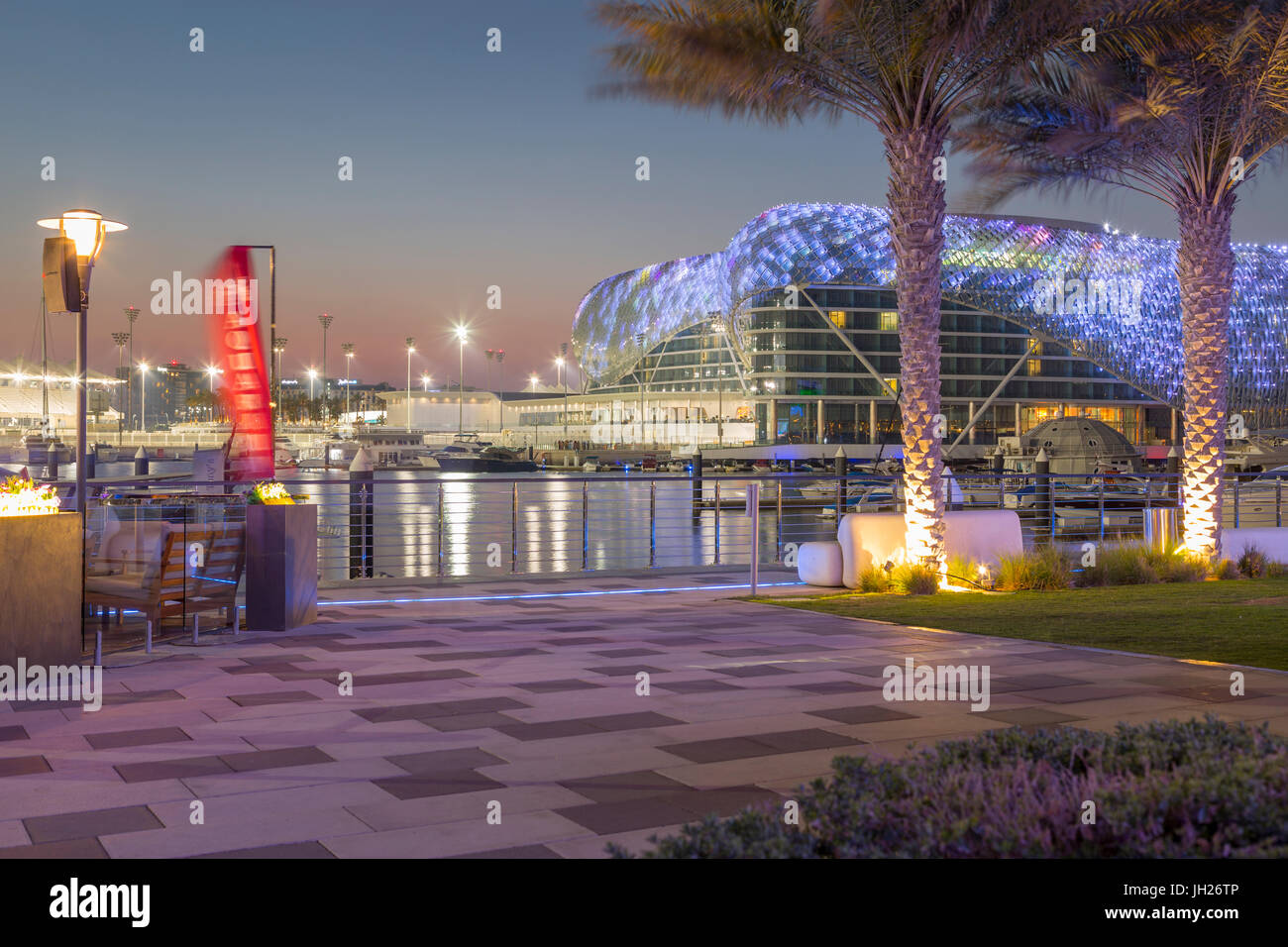 The Yas Viceroy Hotel and Yas Marina at dusk, Yas Island, Abu Dhabi ...