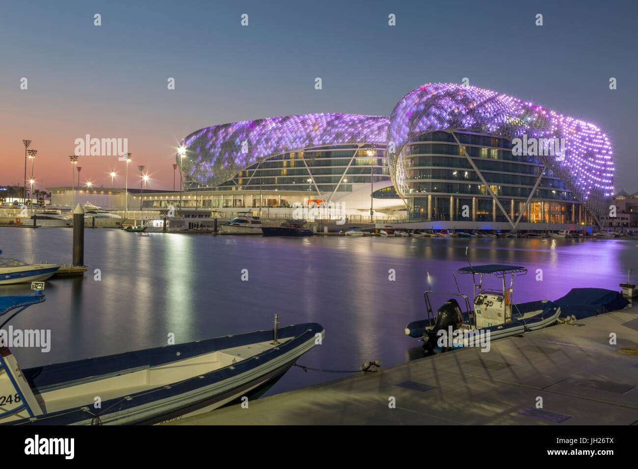The Yas Viceroy Hotel and Yas Marina at dusk, Yas Island, Abu Dhabi ...