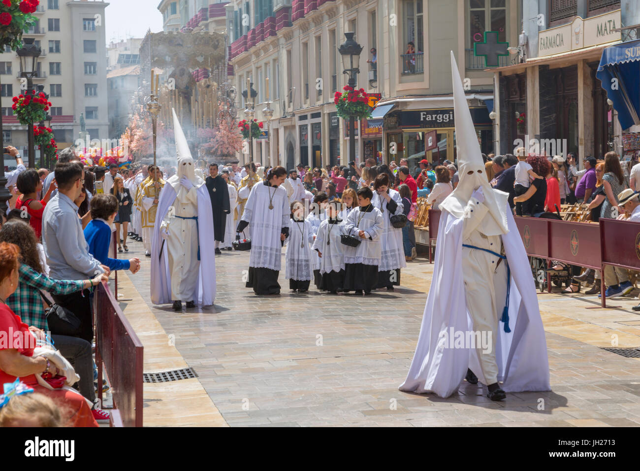 Locals taking part in the Resurrection Parade on Easter Sunday, Malaga ...