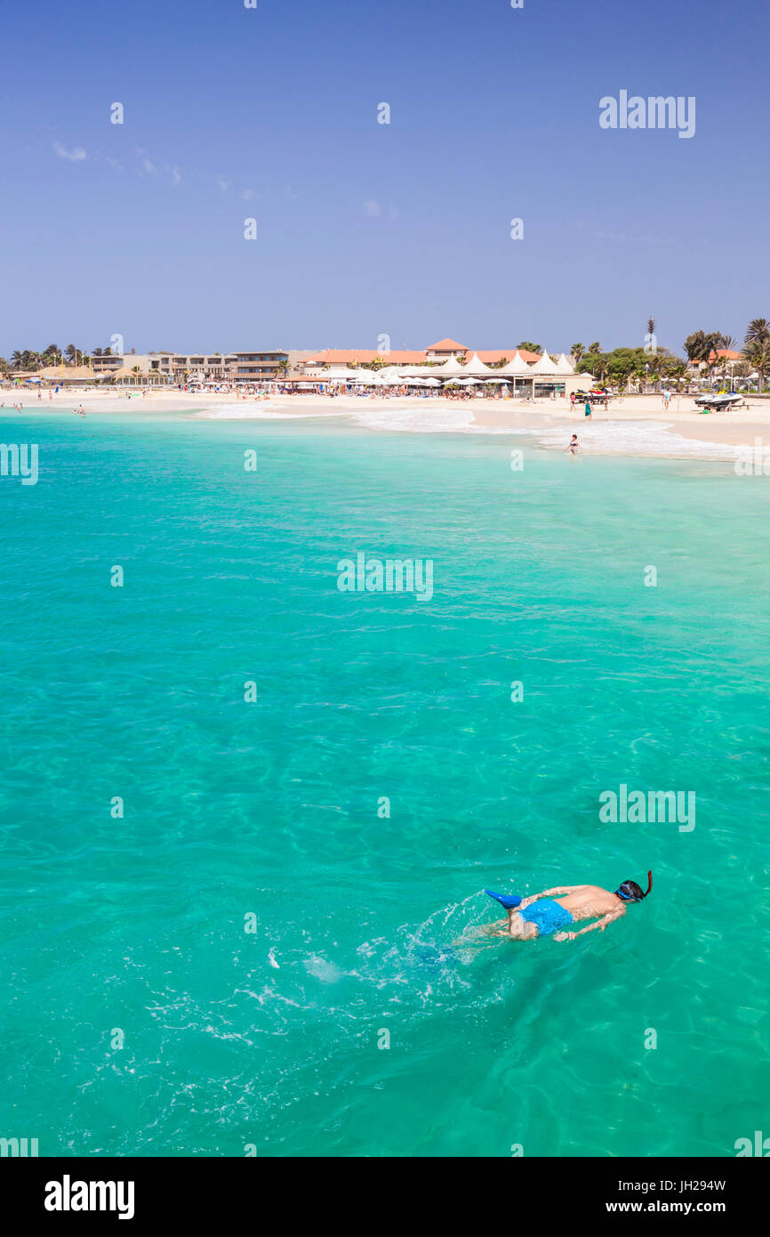 Boy snorkelling off the sandy beach in Santa Maria, Praia de Santa ...