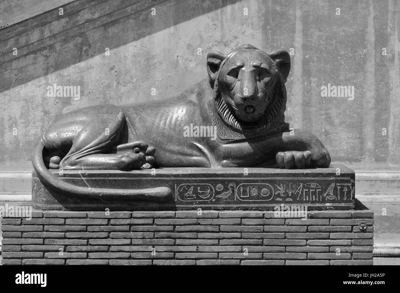 One of the two Basalt recumbent lion statues made for the Pharaoh ...