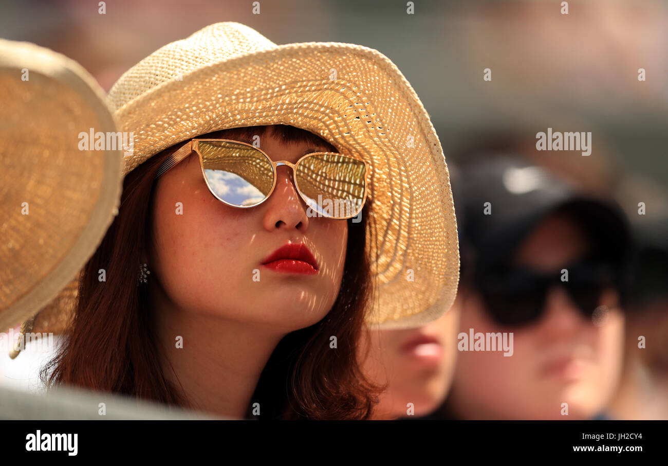 A spectator watches the action on court one on day nine of the ...