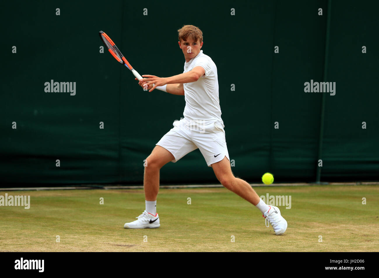 Aidan McHugh in action in the Boys singles on day nine of the Wimbledon Championships at The All ...