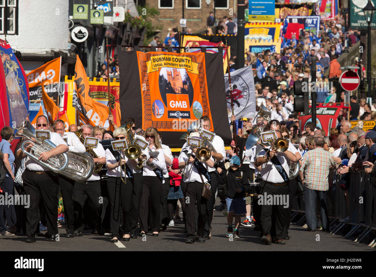 A marching band participates the parade of banners at the Durham Miners ...