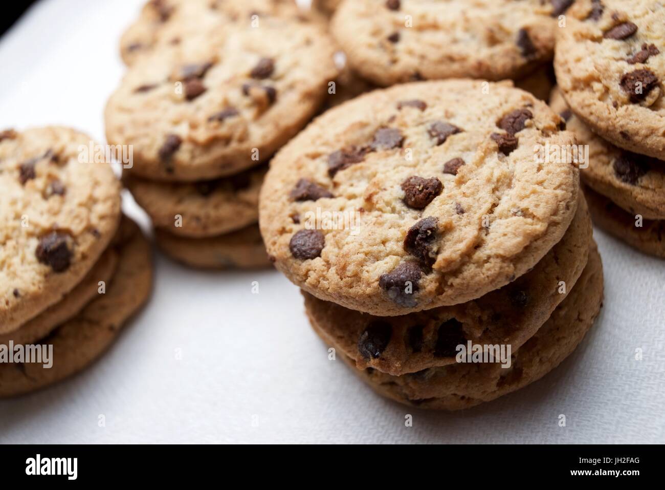 Group of chocolate chips cookies Stock Photo - Alamy