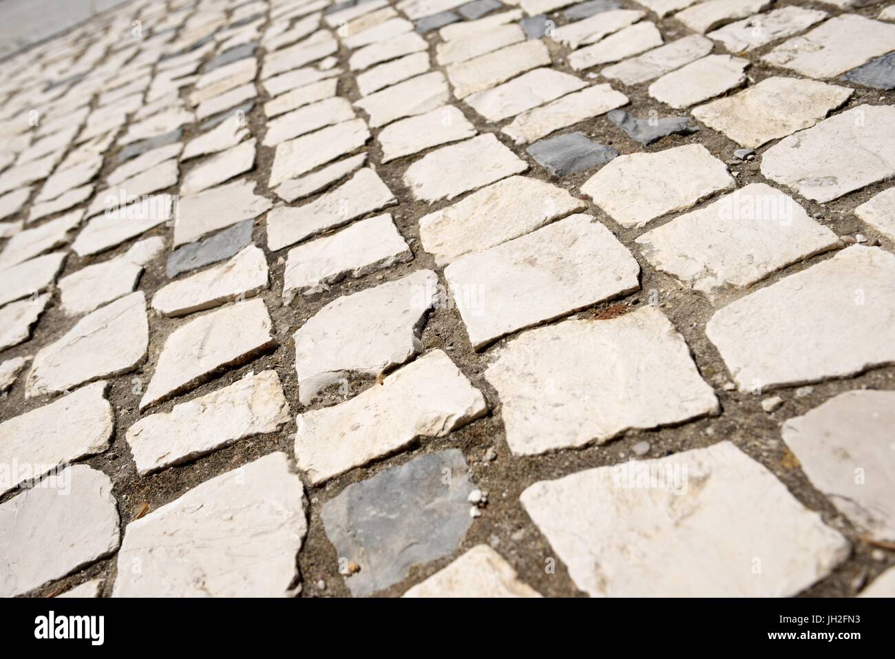Floor of a street with stone tiles Stock Photo - Alamy