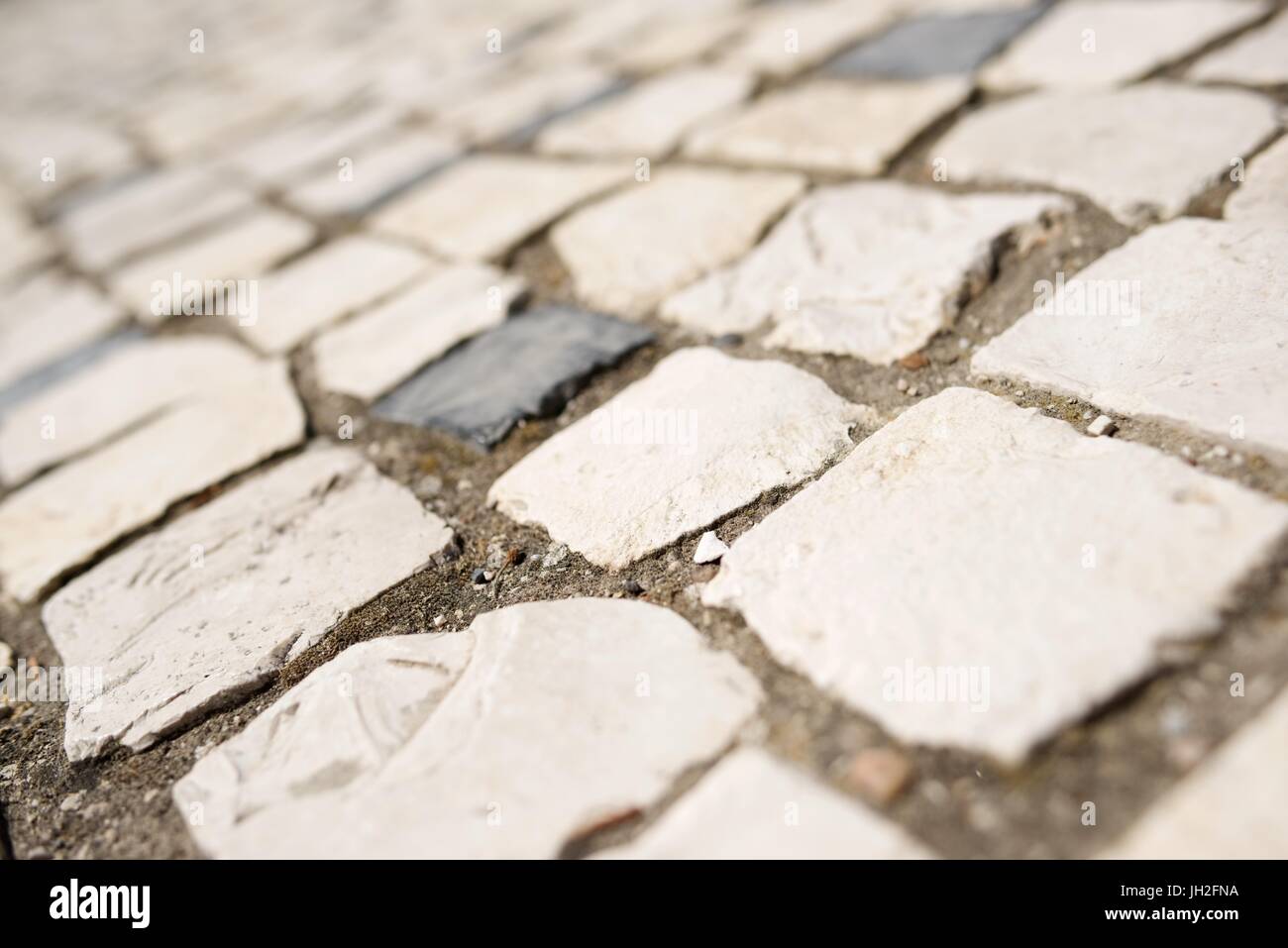 Floor of a street with stone tiles Stock Photo - Alamy