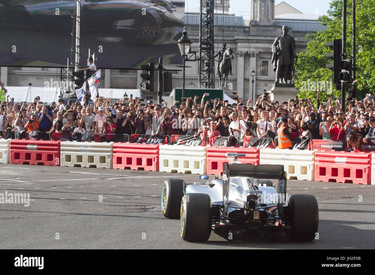 London, UK. 12th July, 2017. Large crowds attend the Formula 1 parade ...