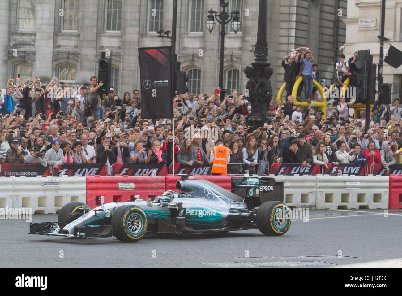 London, UK. 12th July, 2017. Large crowds attend the Formula 1 parade ...