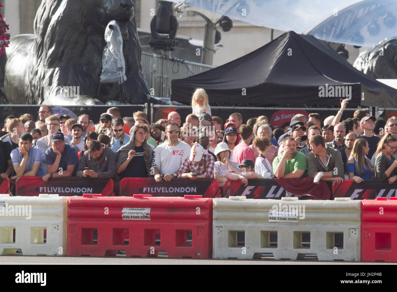 London, UK. 12th July, 2017. Large crowds attend the Formula 1 parade ...