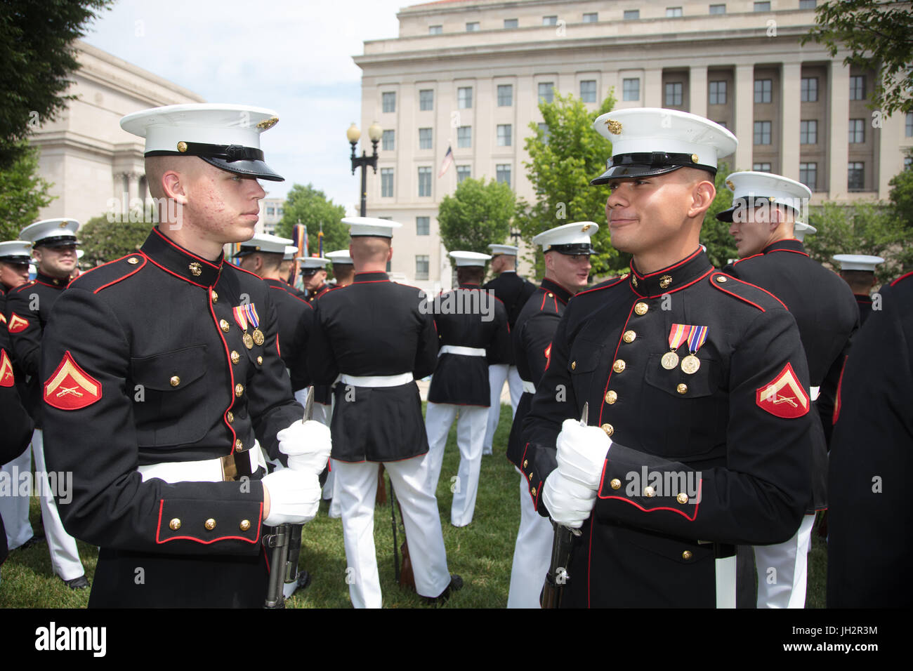 Members of the U.S. Marine Corps Marching Unit prepare to march in the ...