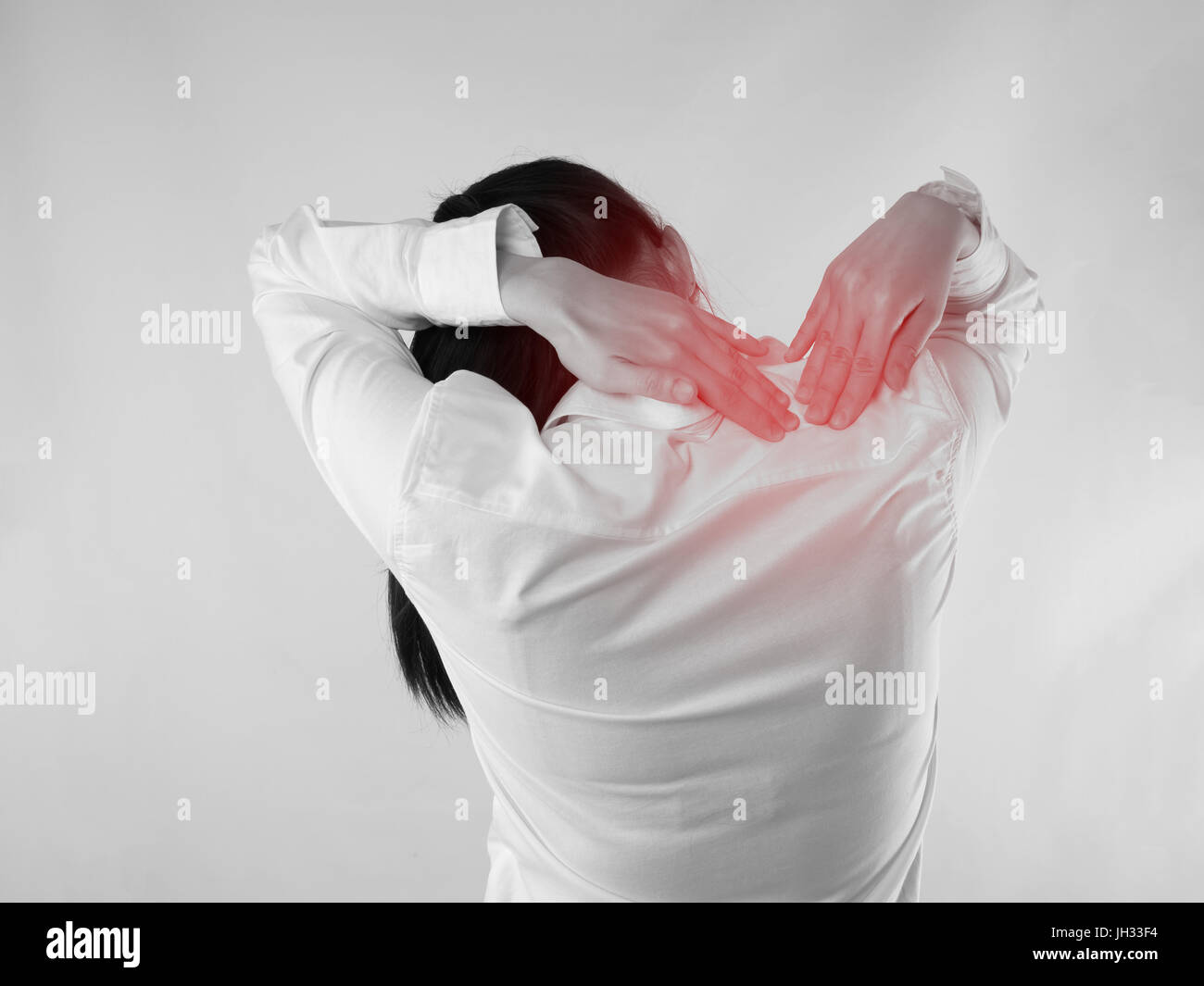 Young Asian woman touching back bone and having backache, concept of ...