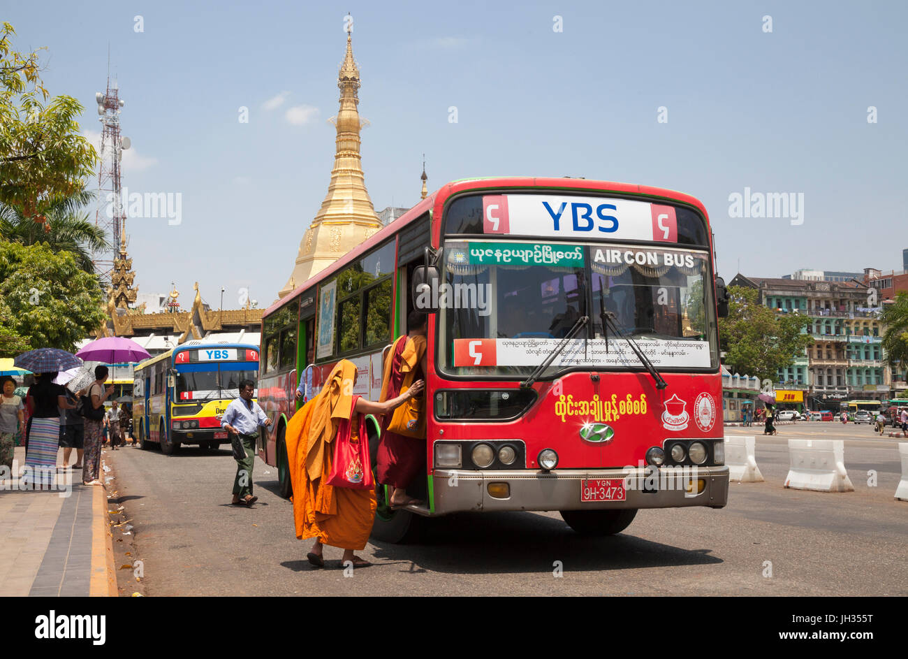 Monks boarding bus from Yangon Bus Service (YBS) serving Myanmar's ...