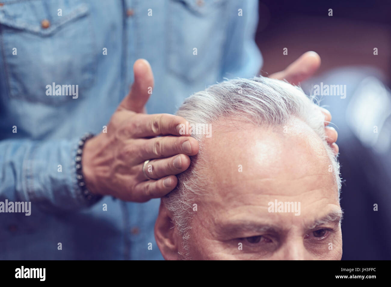 Professional hairdresser styling hair male hi-res stock photography and ...