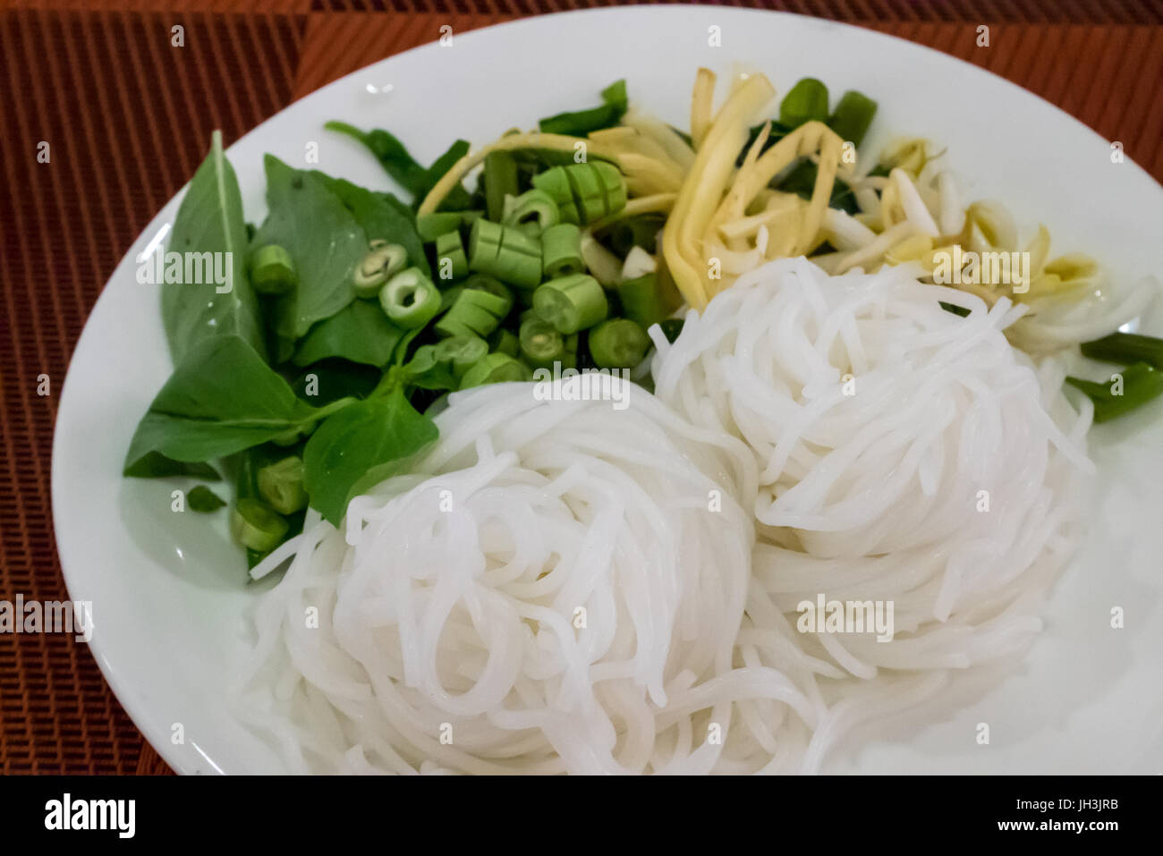The close up of Thai fermented rice flour noodle (Khanom chin) with ...