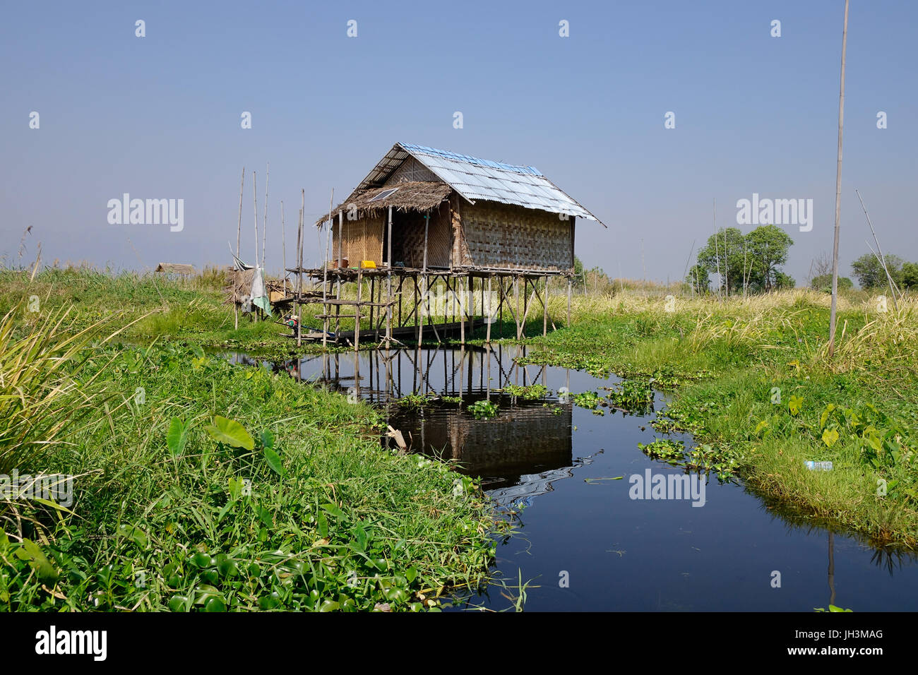 Traditional bamboo stilt house on the Inle lake, Myanmar. Inle Lake is ...
