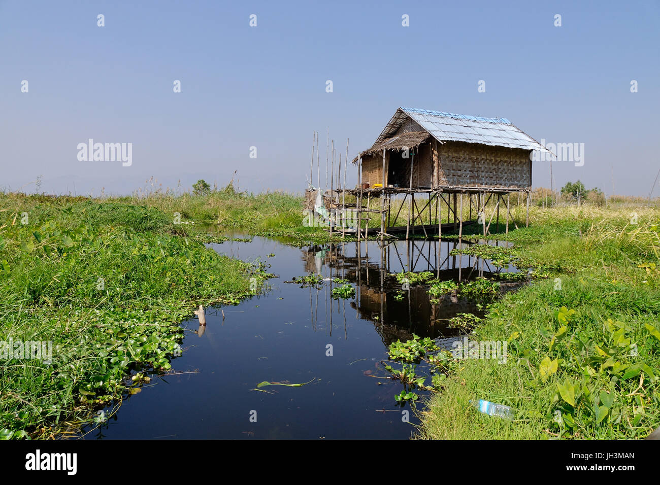 Traditional bamboo stilt house on the Inle lake, Myanmar. Inle Lake is ...