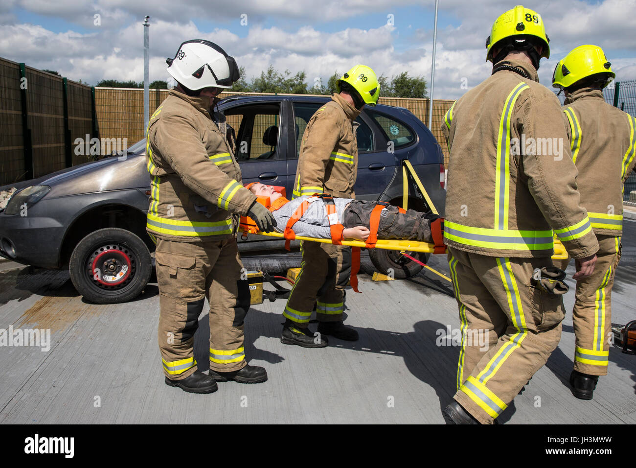 British firefighters carrying out casualty rescue drill Stock Photo - Alamy