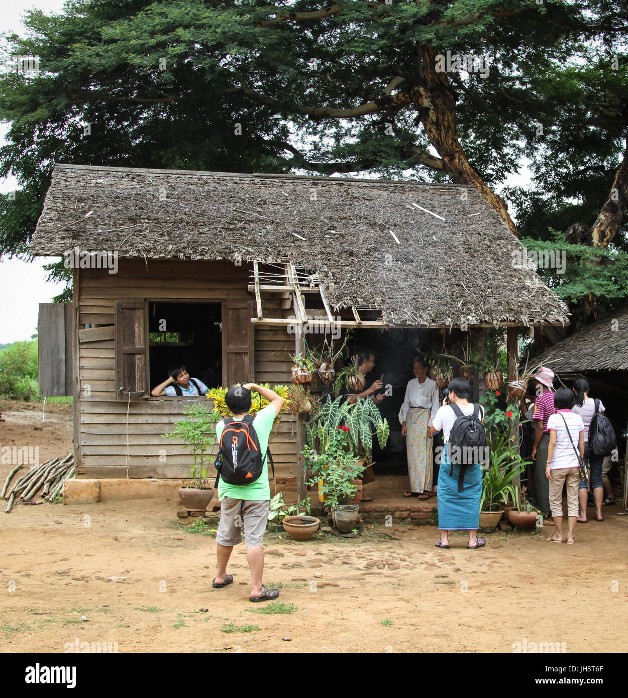 Bagan, Myanmar - Oct 2, 2011. Tourists visit small village at Bagan ...