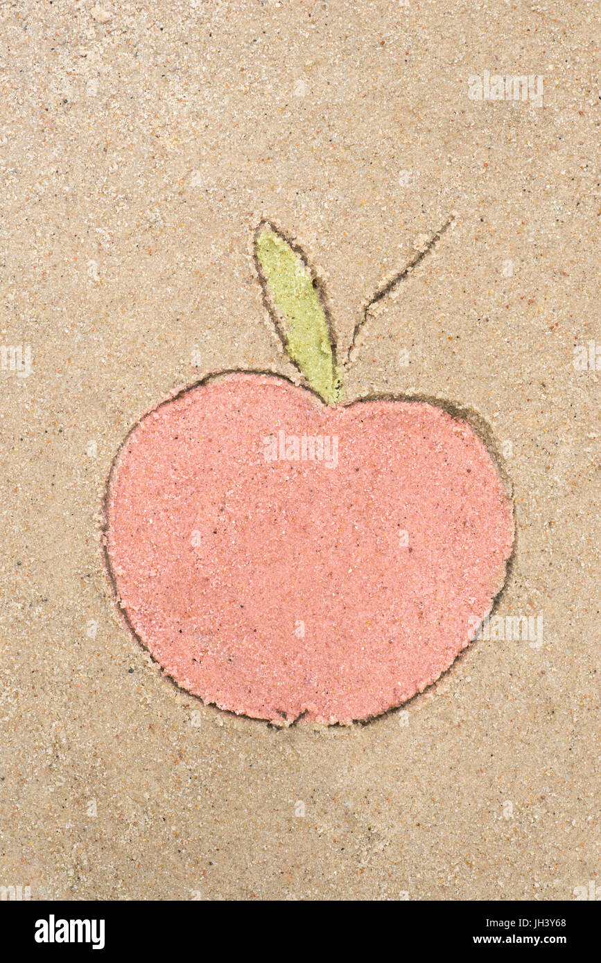 apple drawing in sand background Stock Photo - Alamy