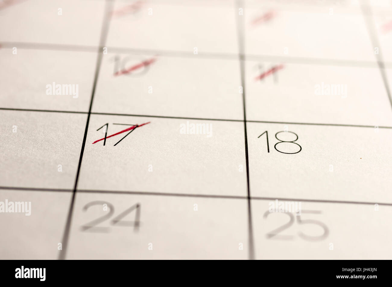 Close up shot of a calendar with marked out dates Stock Photo - Alamy
