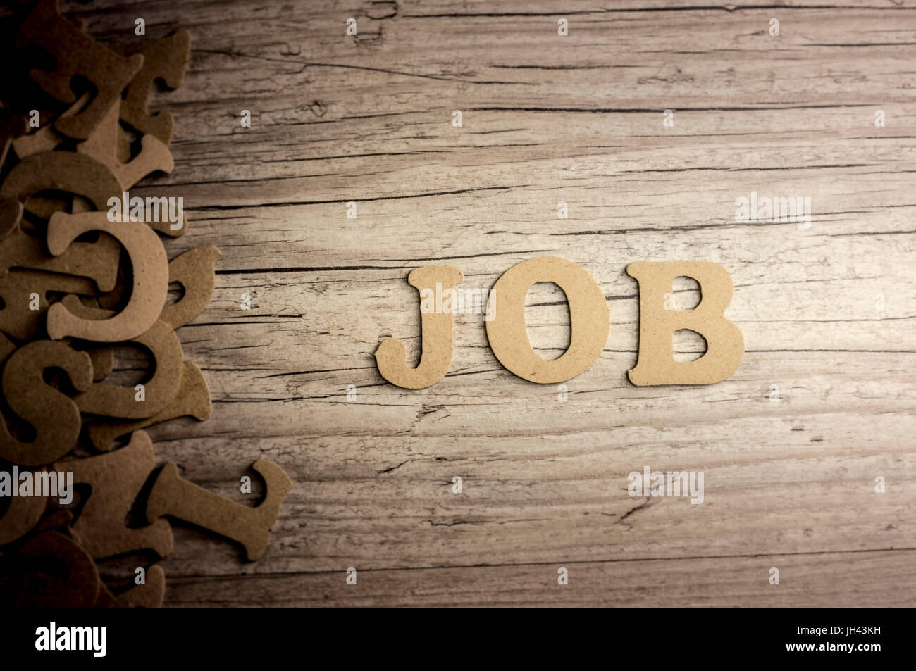 The word JOB is assembled with wooden letters Stock Photo - Alamy