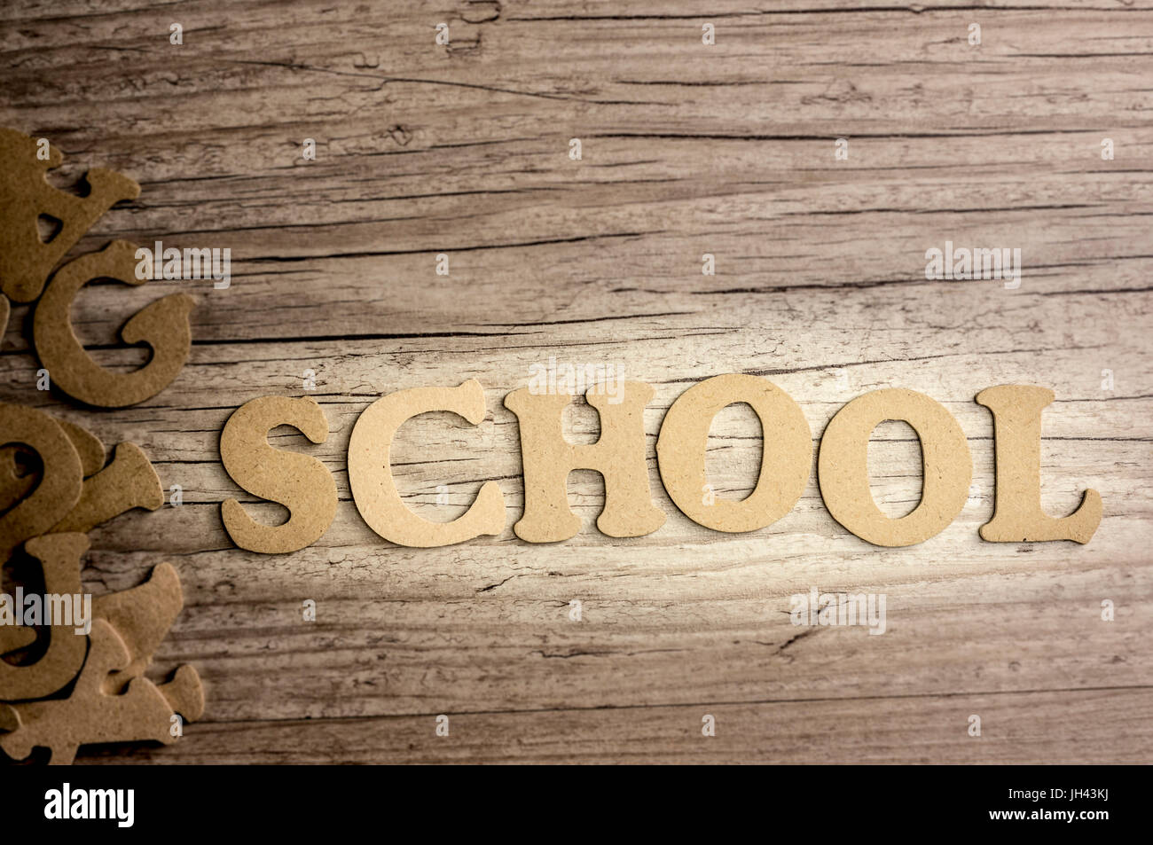 The word SCHOOL is assembled with wooden letters Stock Photo - Alamy