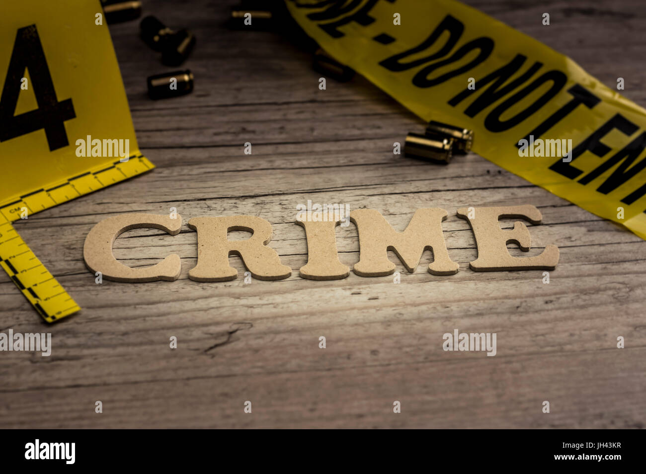 The word CRIME is assembled with wooden letters Stock Photo - Alamy