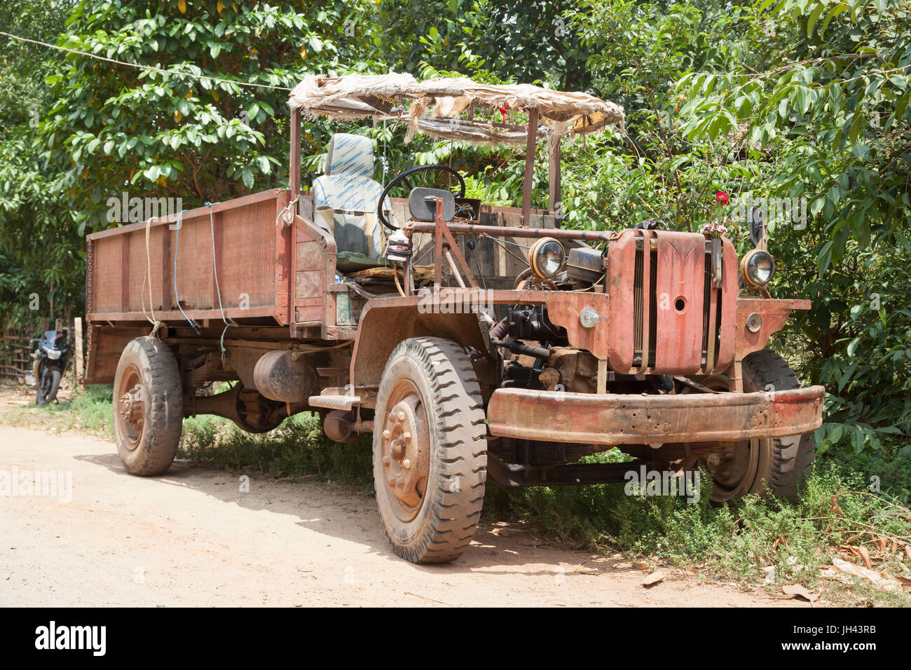 Vintage truck still in widespread use today in Myanmar. Modified from a ...