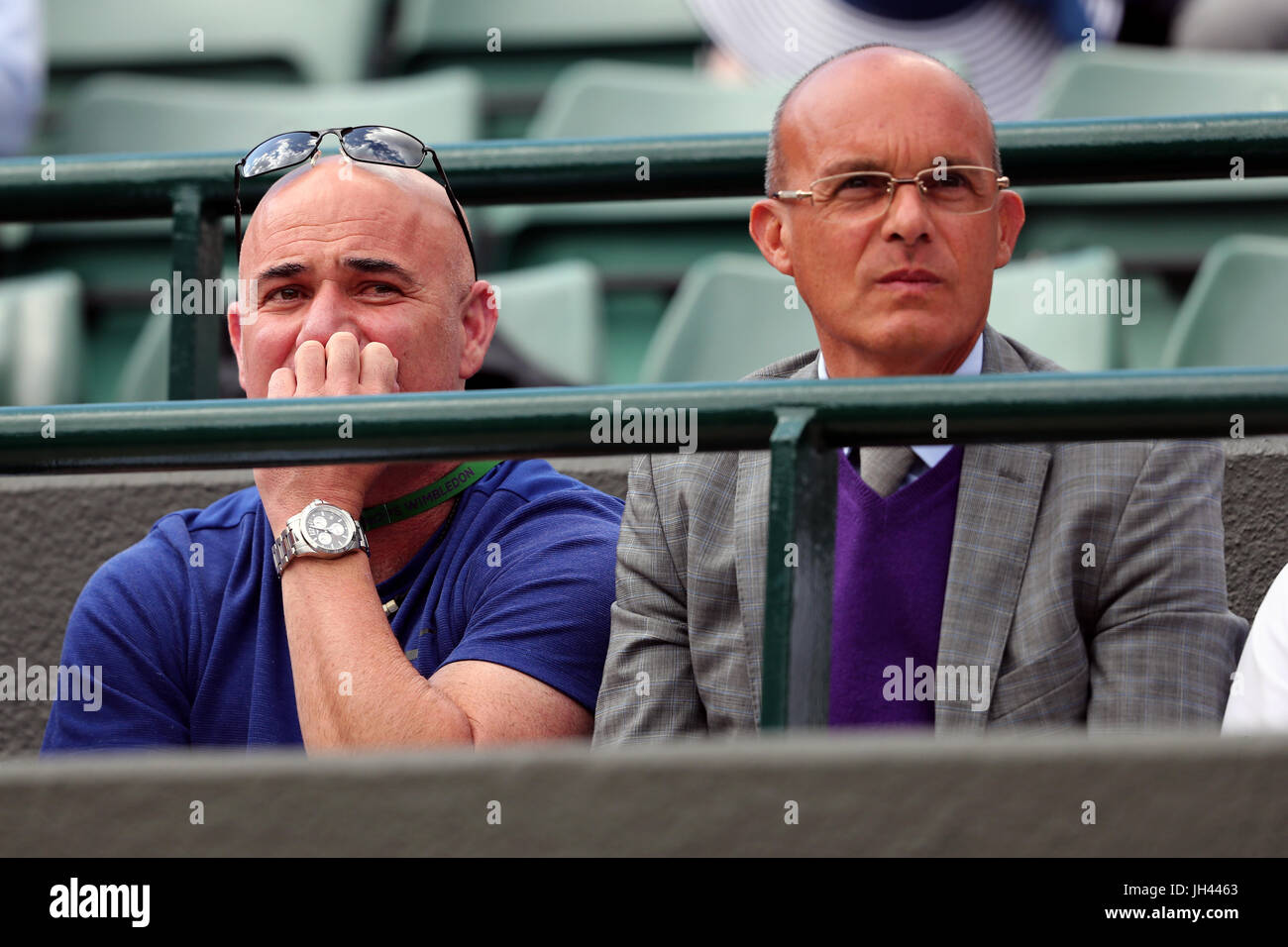 Novak Djokovic's coach Andre Agassi (left) on day nine of the Wimbledon ...