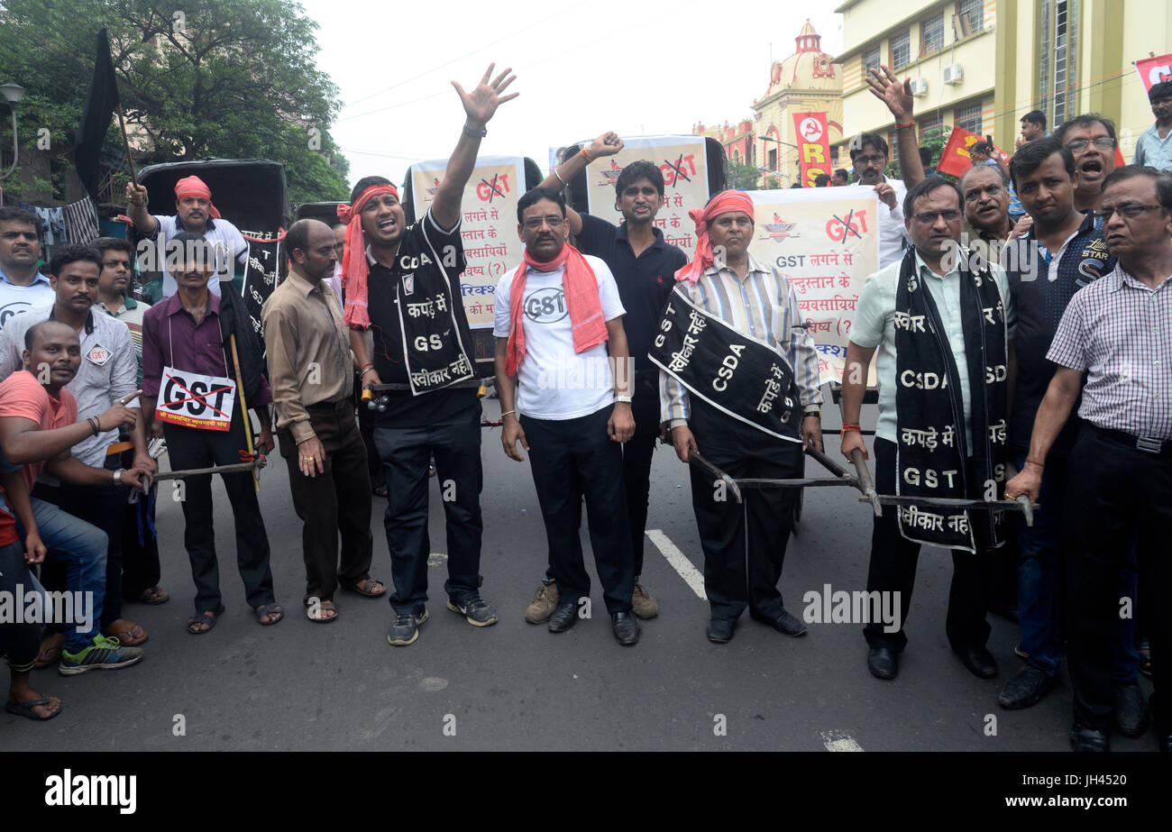 Textile Industries worker rallied with hand pulling rickshaw to show ...