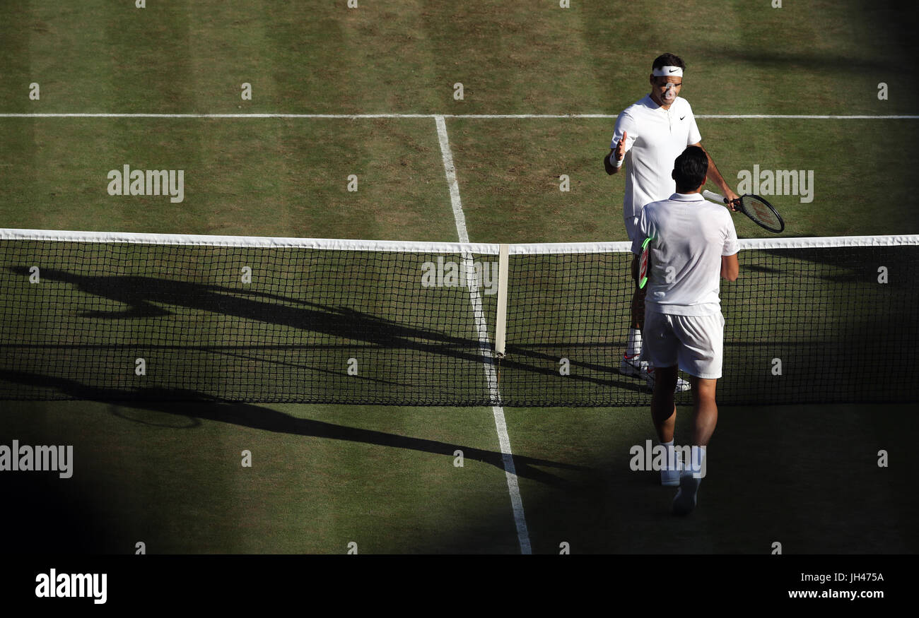 Roger Federer celebrates beating Milos Raonic on day nine of the ...